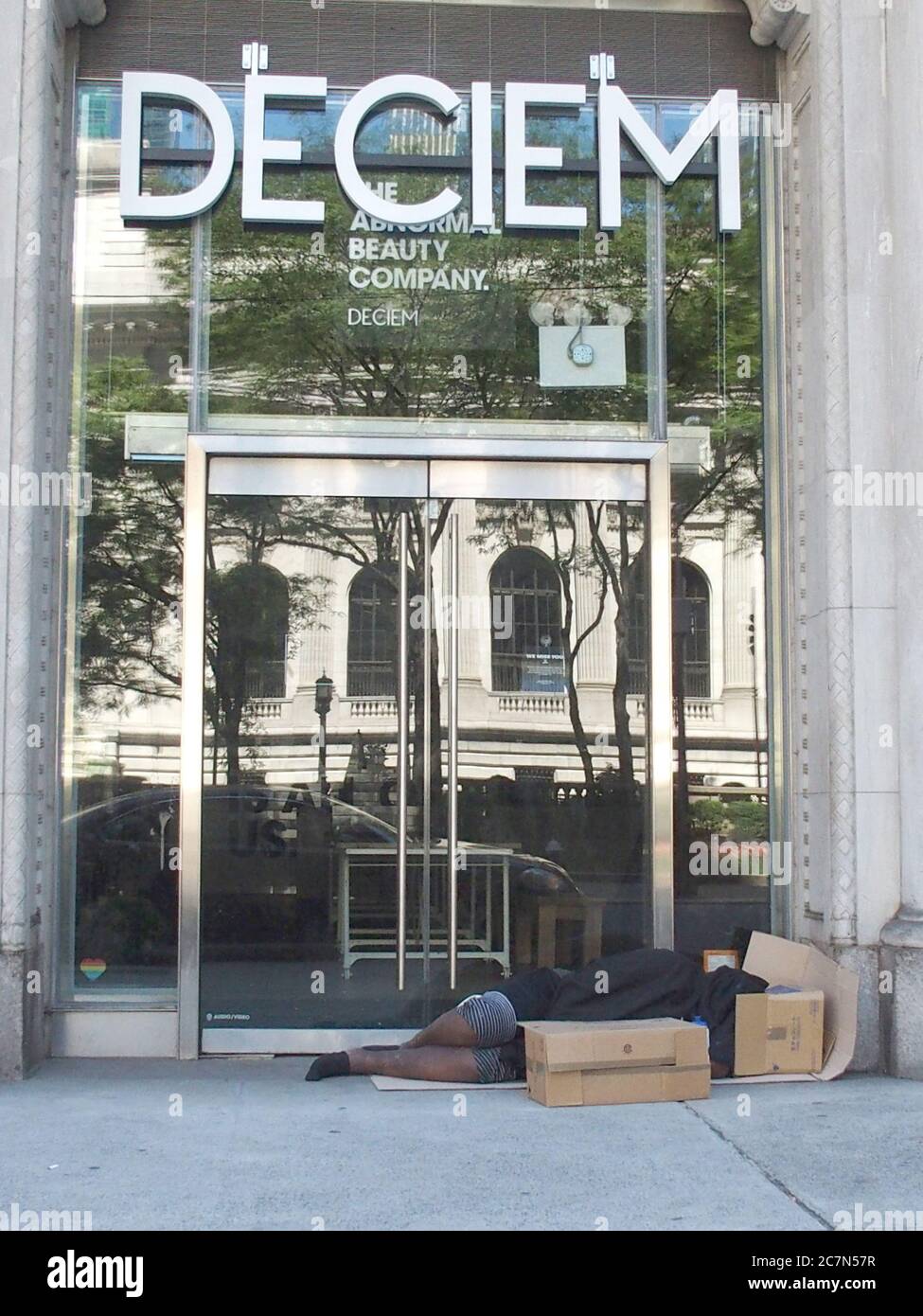 Homeless sleeping in library hi-res stock photography and images - Alamy