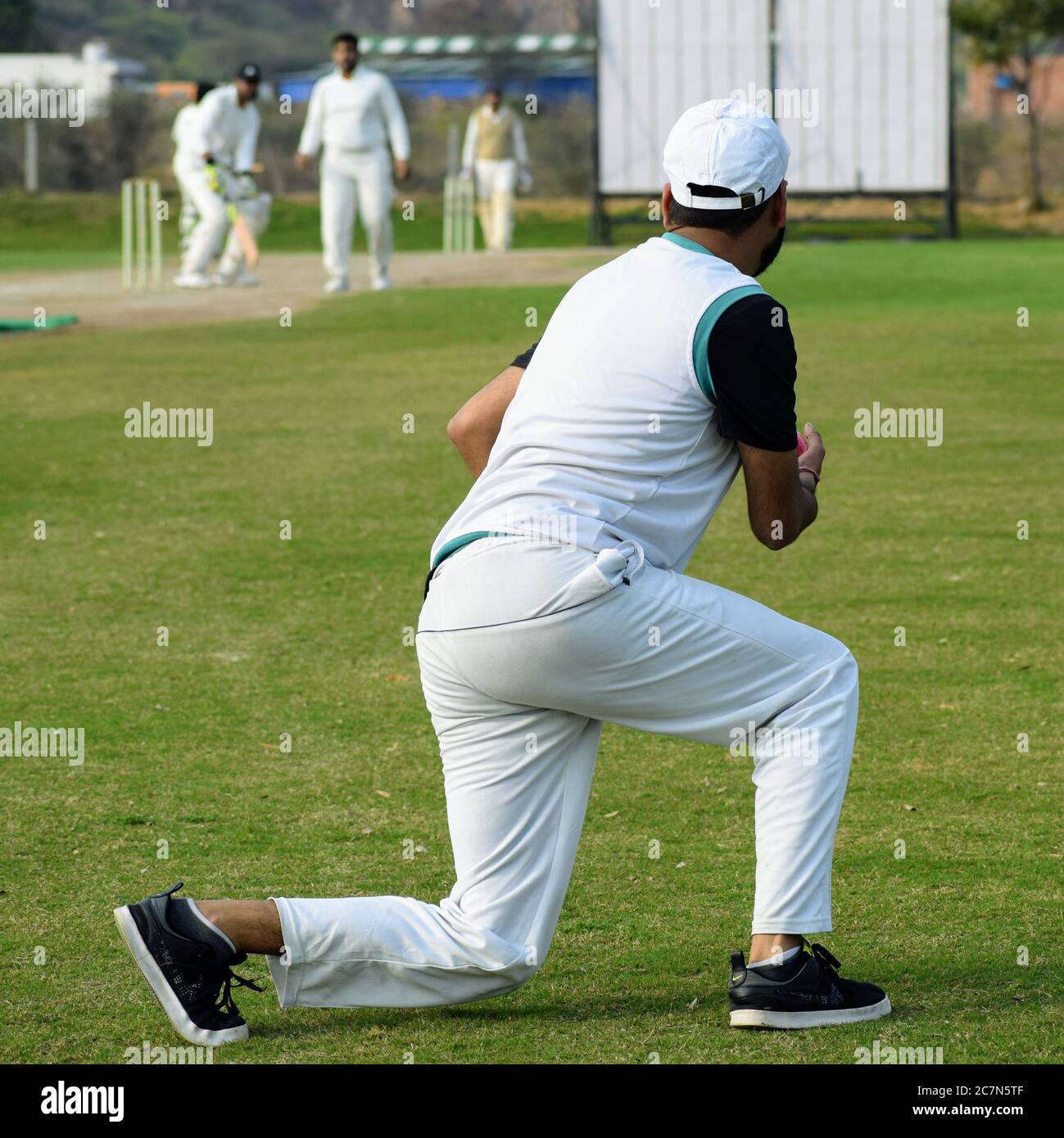Full length of cricketer playing on field during sunny day, Cricketer ...