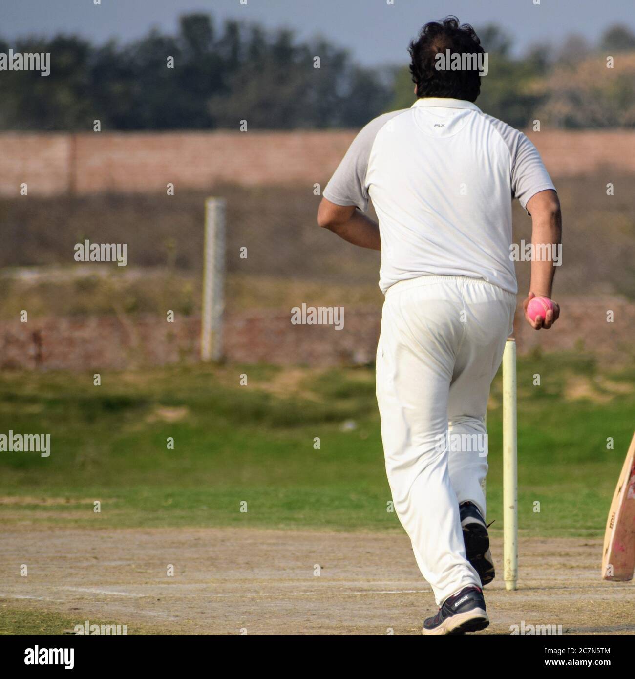 Cricket player full uniform hi-res stock photography and images - Alamy