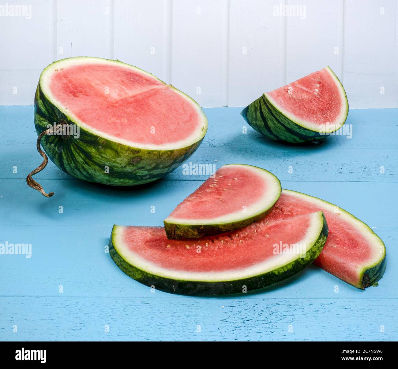 Watermelon cut on blue hi-res stock photography and images - Alamy