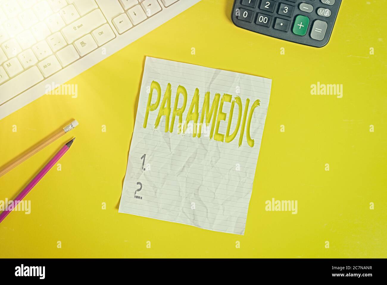 Writing note showing Paramedic. Business concept for a health worker ...