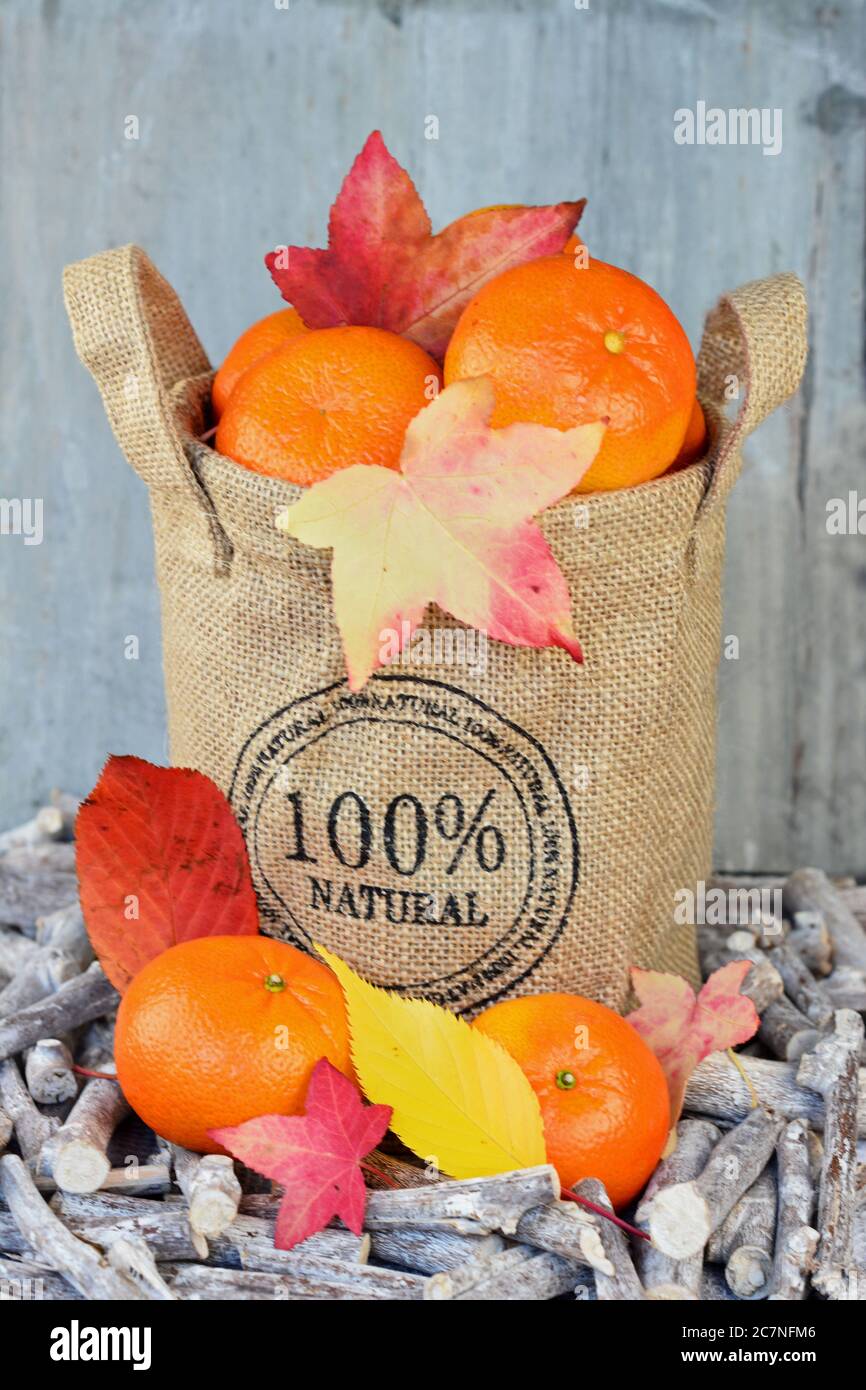 Oranges in a bag vertical hi-res stock photography and images - Alamy