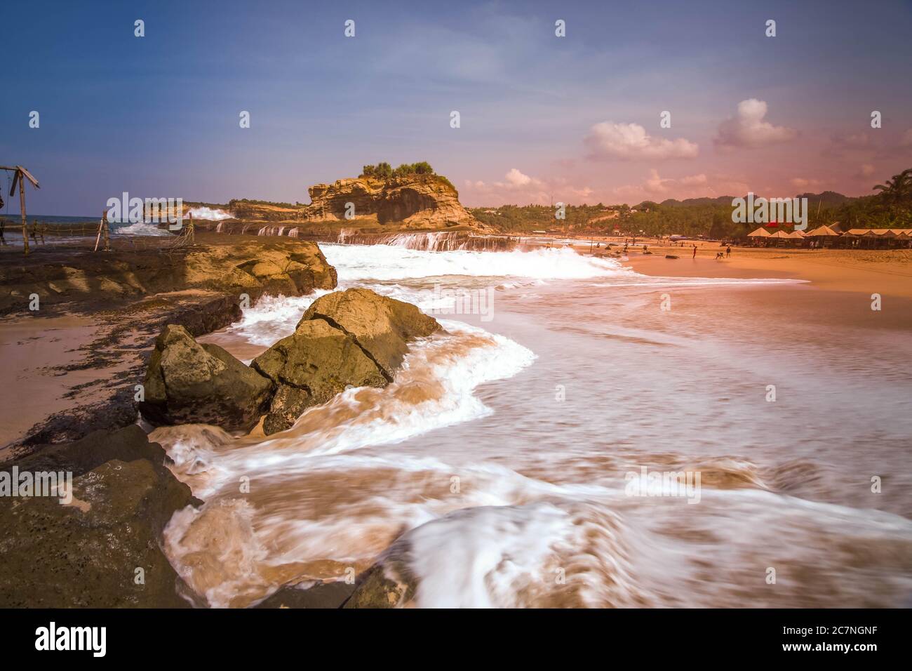 The beauty of Klayar Beach with its unique coral stones and coconut ...