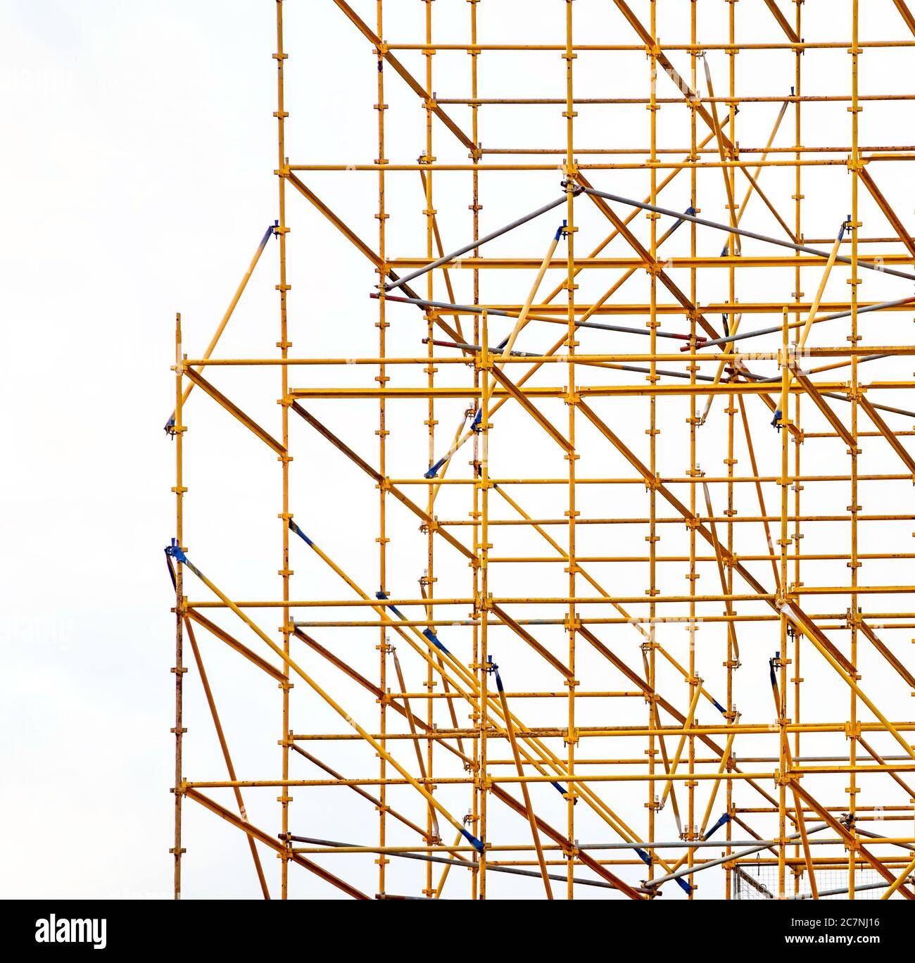 Scaffolding on a large construction with white background Stock Photo ...