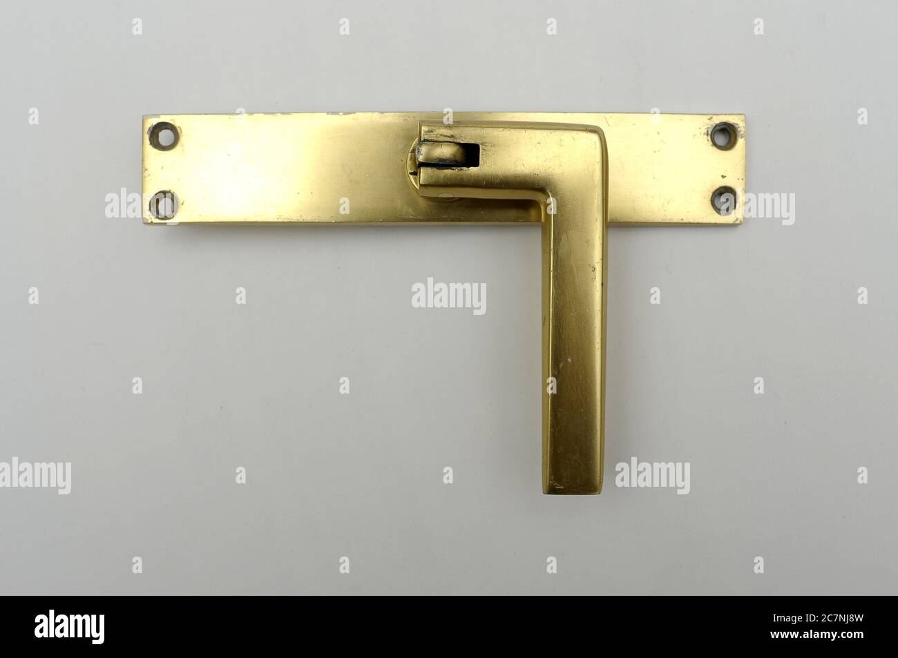 folding door handle clearly used Stock Photo - Alamy