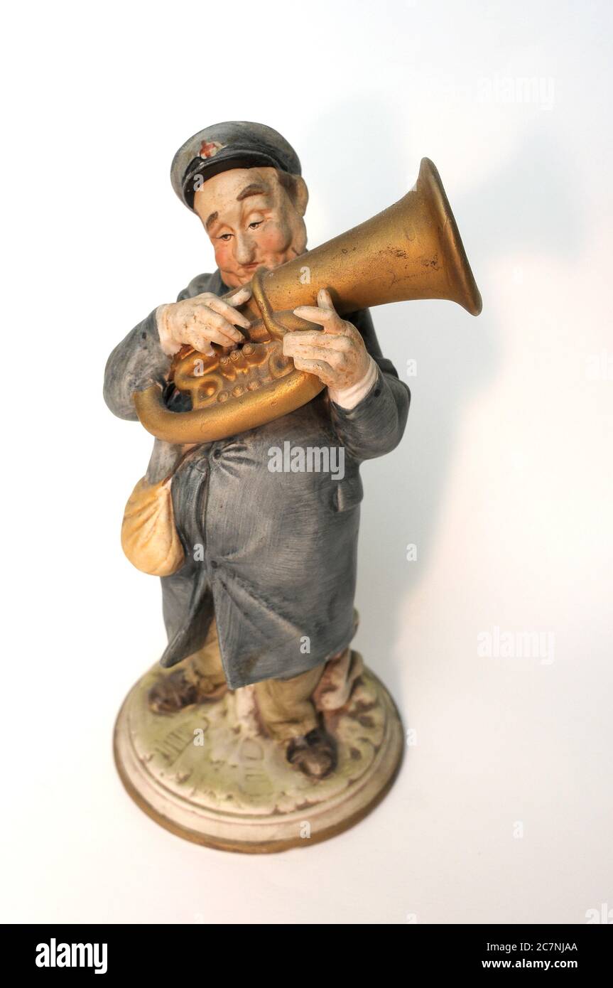 biscuit porcelain figure, musician playing the trombone Stock Photo - Alamy