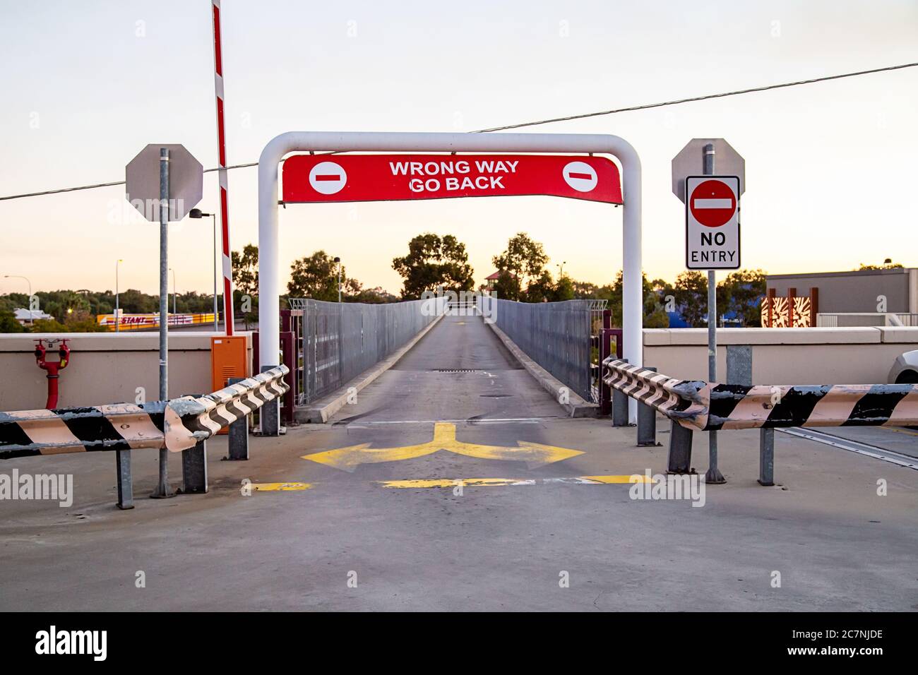 Wrong way sign at a car park exit Stock Photo - Alamy