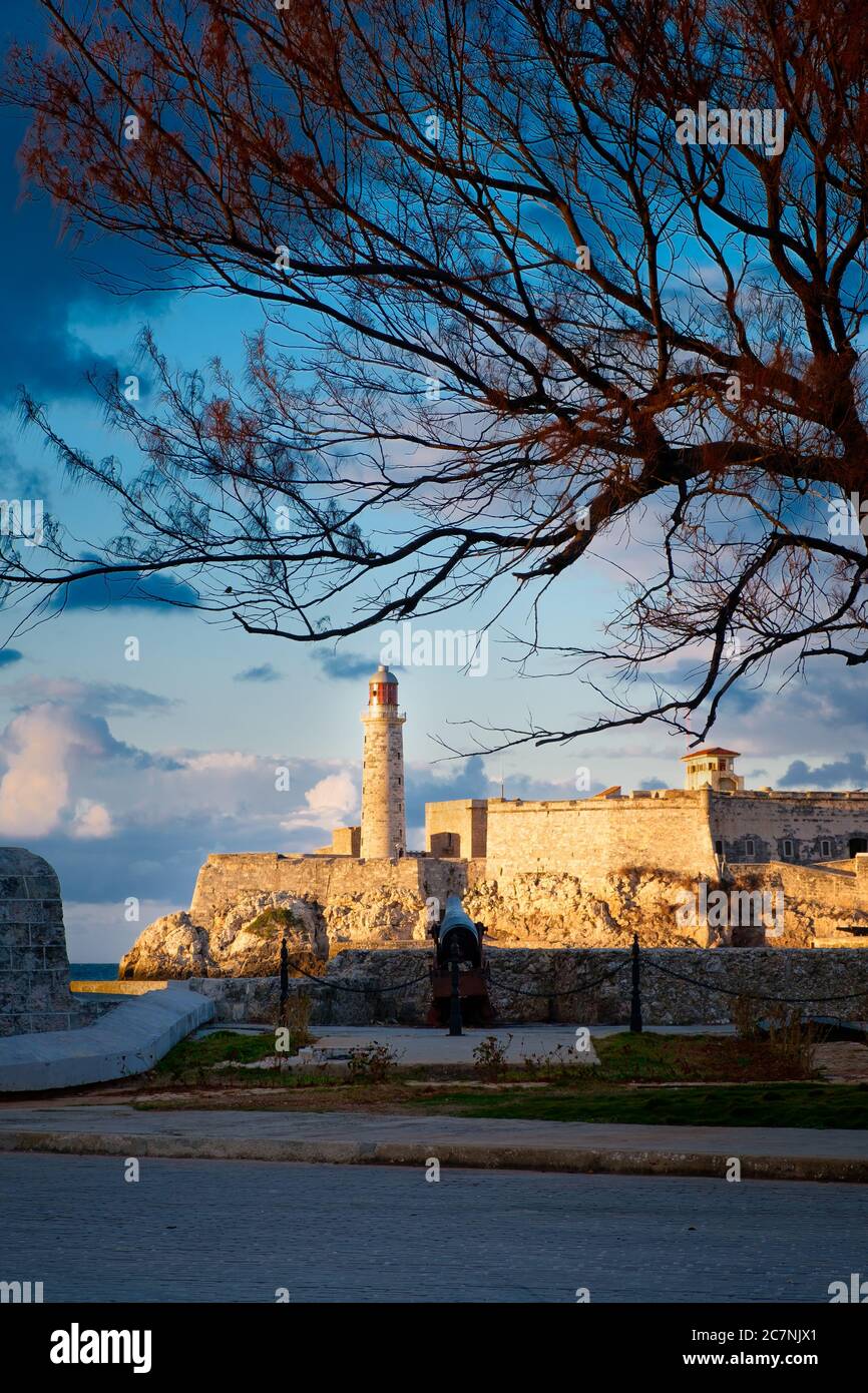 The fortress and lighthouse of El Morro, a symbol of Havana at sunset ...