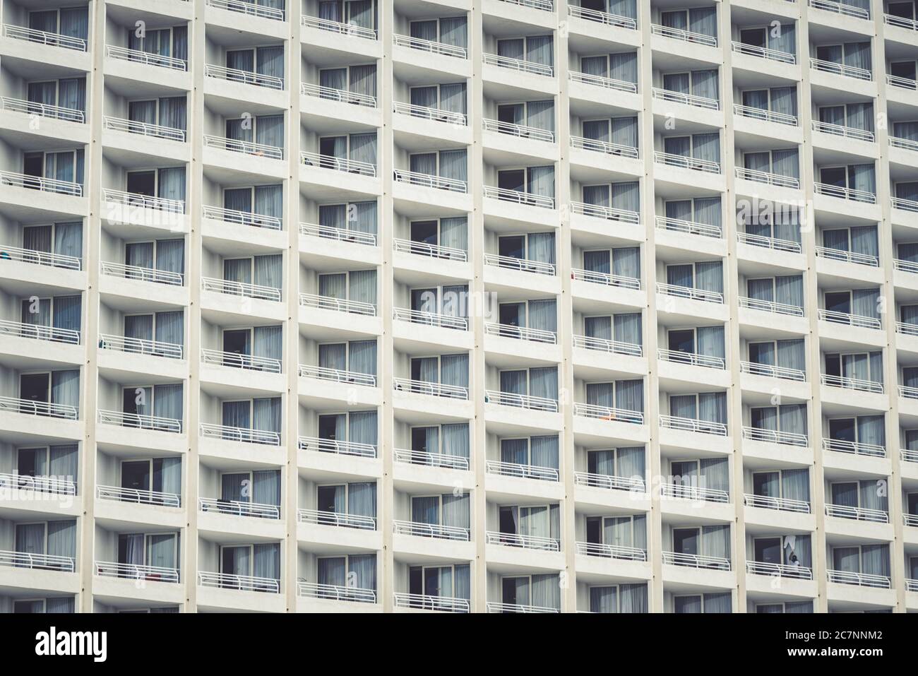 Horizontal shot of balconies of modern apartment buildings in the city ...
