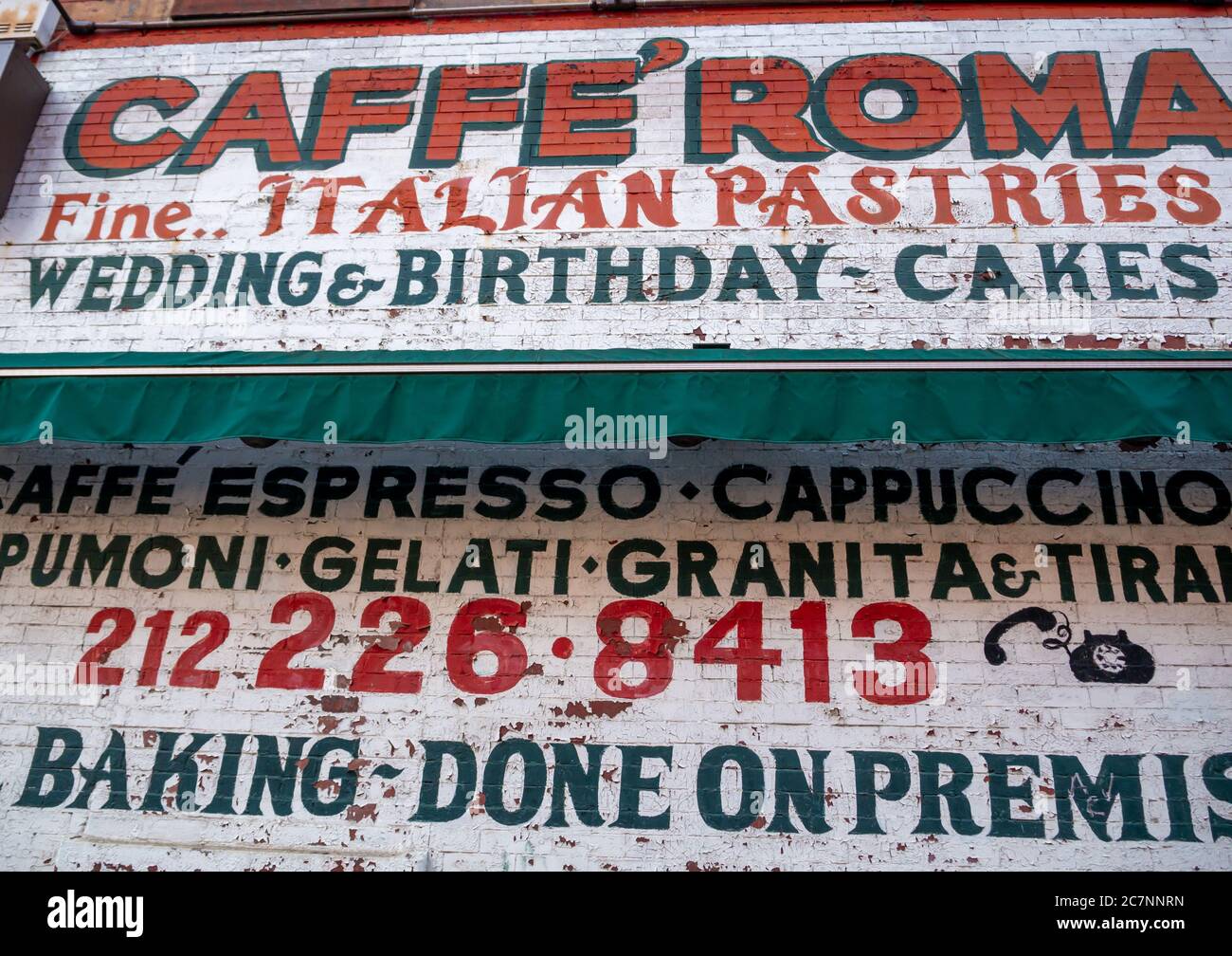 Caffe Roma wall sign in New York Little Italy Stock Photo - Alamy