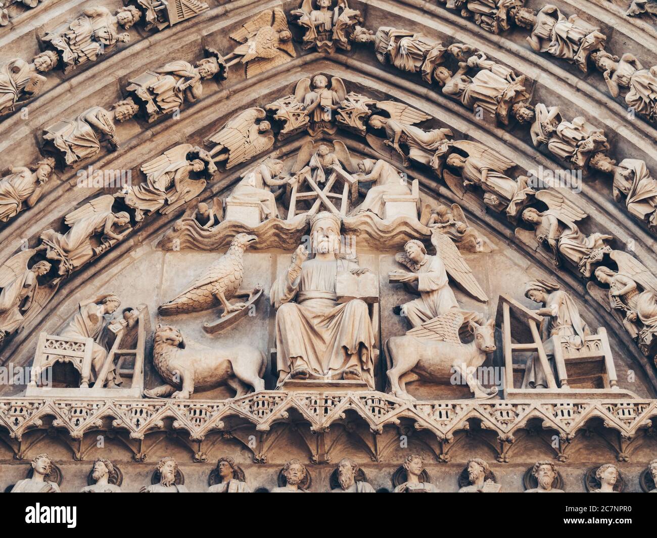 Closeup shot of statues of human figures on an exterior wall of a ...