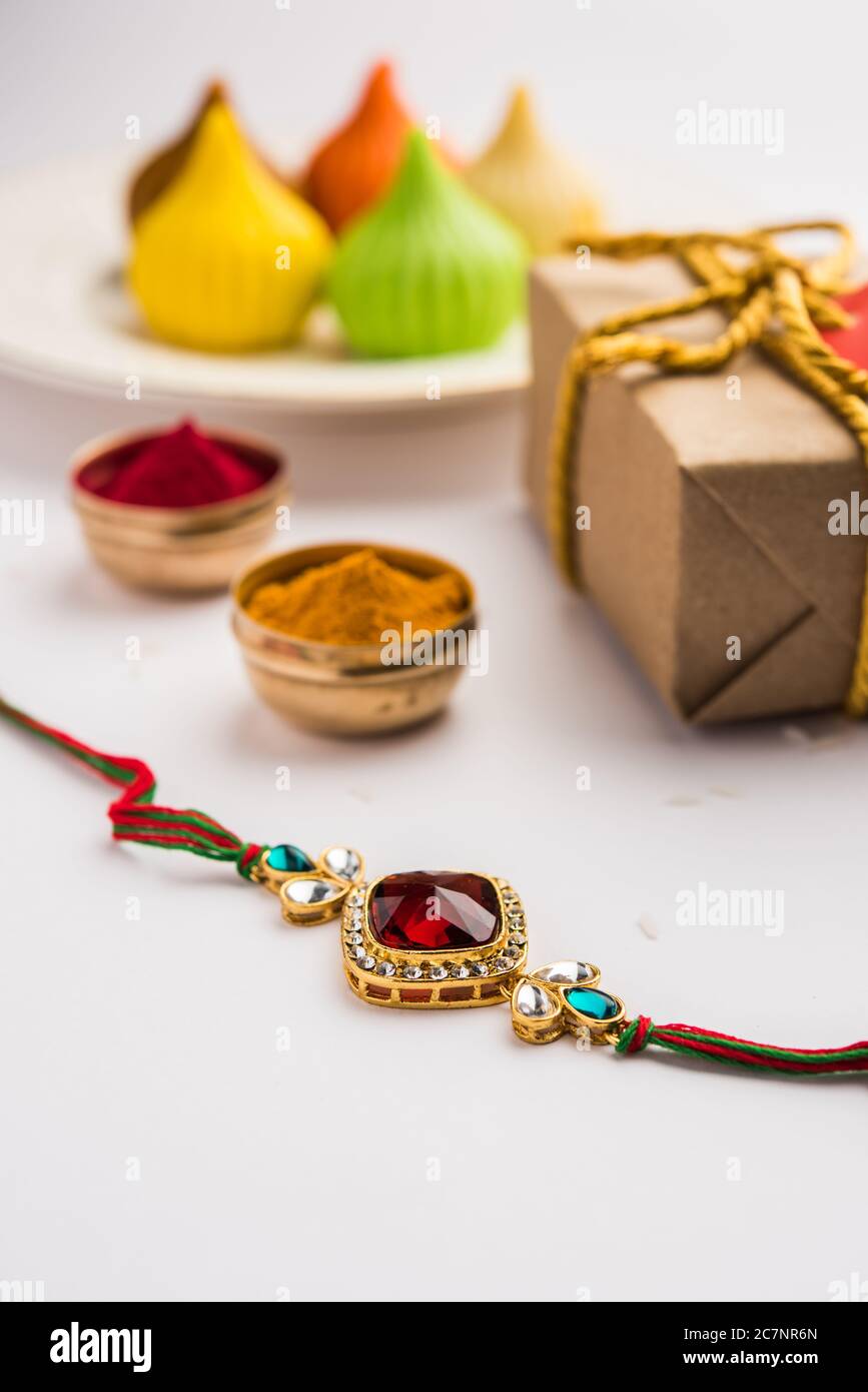 Raksha Bandhan / Rakshabandhan Rakhi with Haldi Kumkum rice, sweet ...