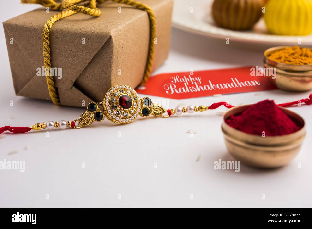 Raksha Bandhan / Rakshabandhan Rakhi with Haldi Kumkum rice, sweet ...