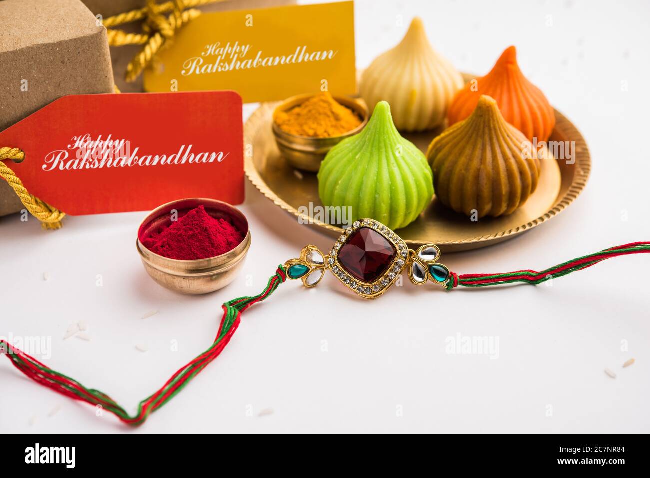 Raksha Bandhan / Rakshabandhan Rakhi with Haldi Kumkum rice, sweet ...