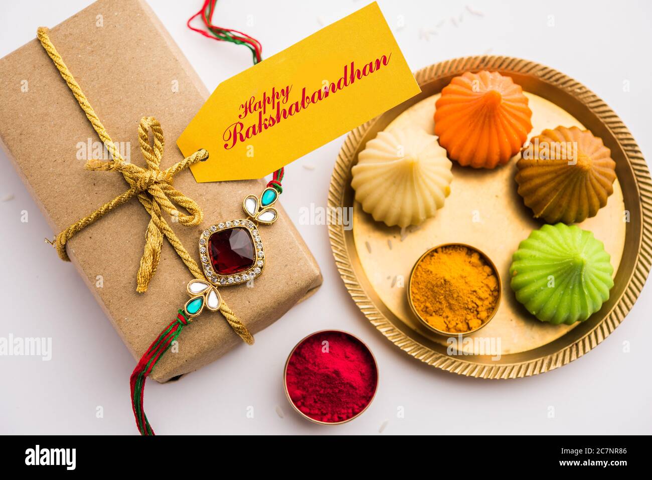 Raksha Bandhan / Rakshabandhan Rakhi with Haldi Kumkum rice, sweet ...
