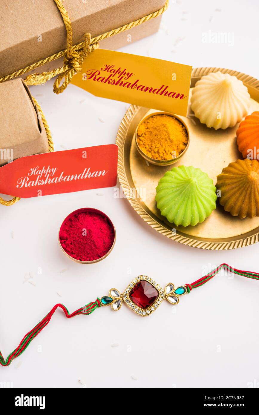 Raksha Bandhan / Rakshabandhan Rakhi with Haldi Kumkum rice, sweet ...