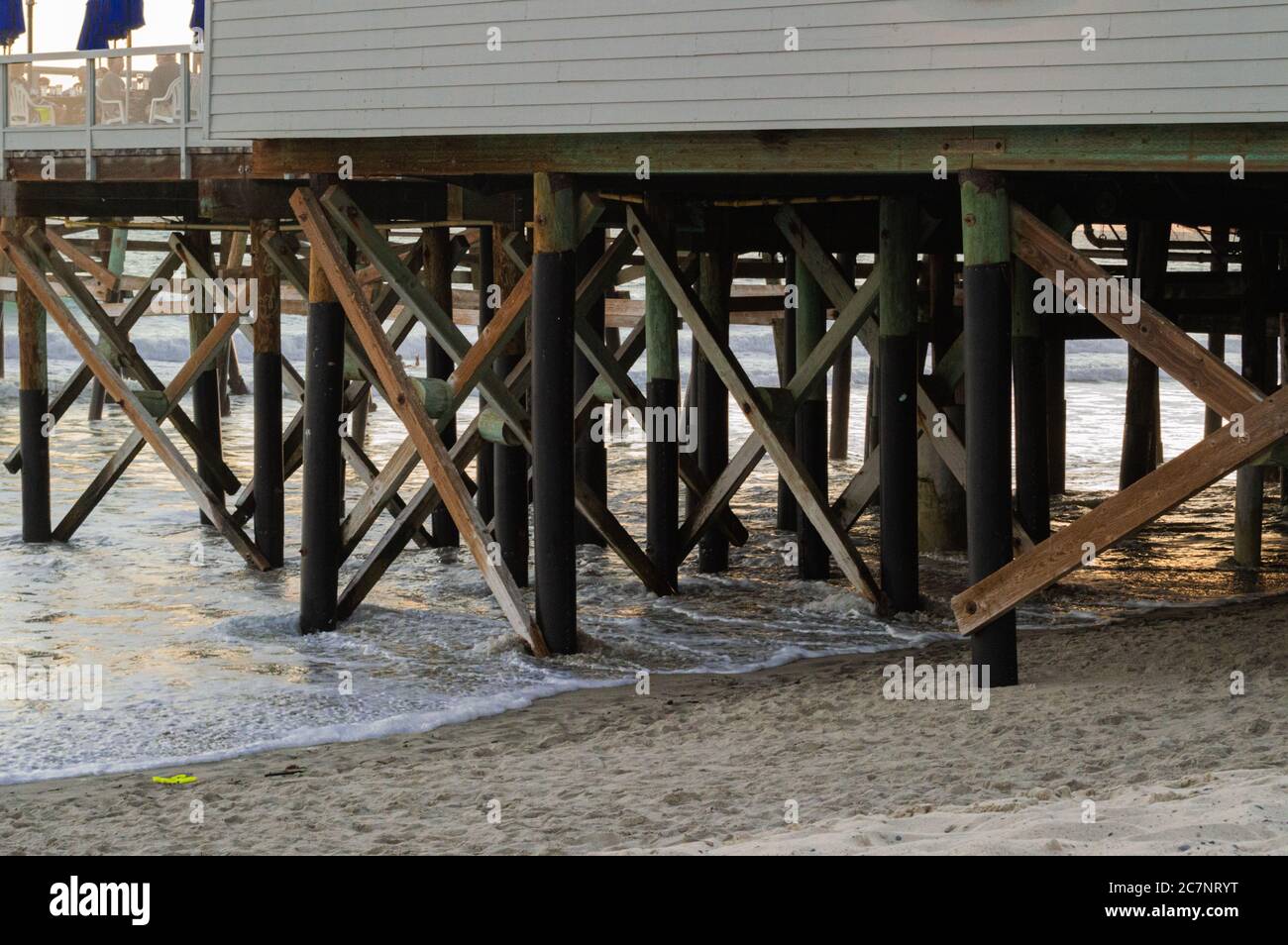 Metal steel structure under the pier Stock Photo - Alamy