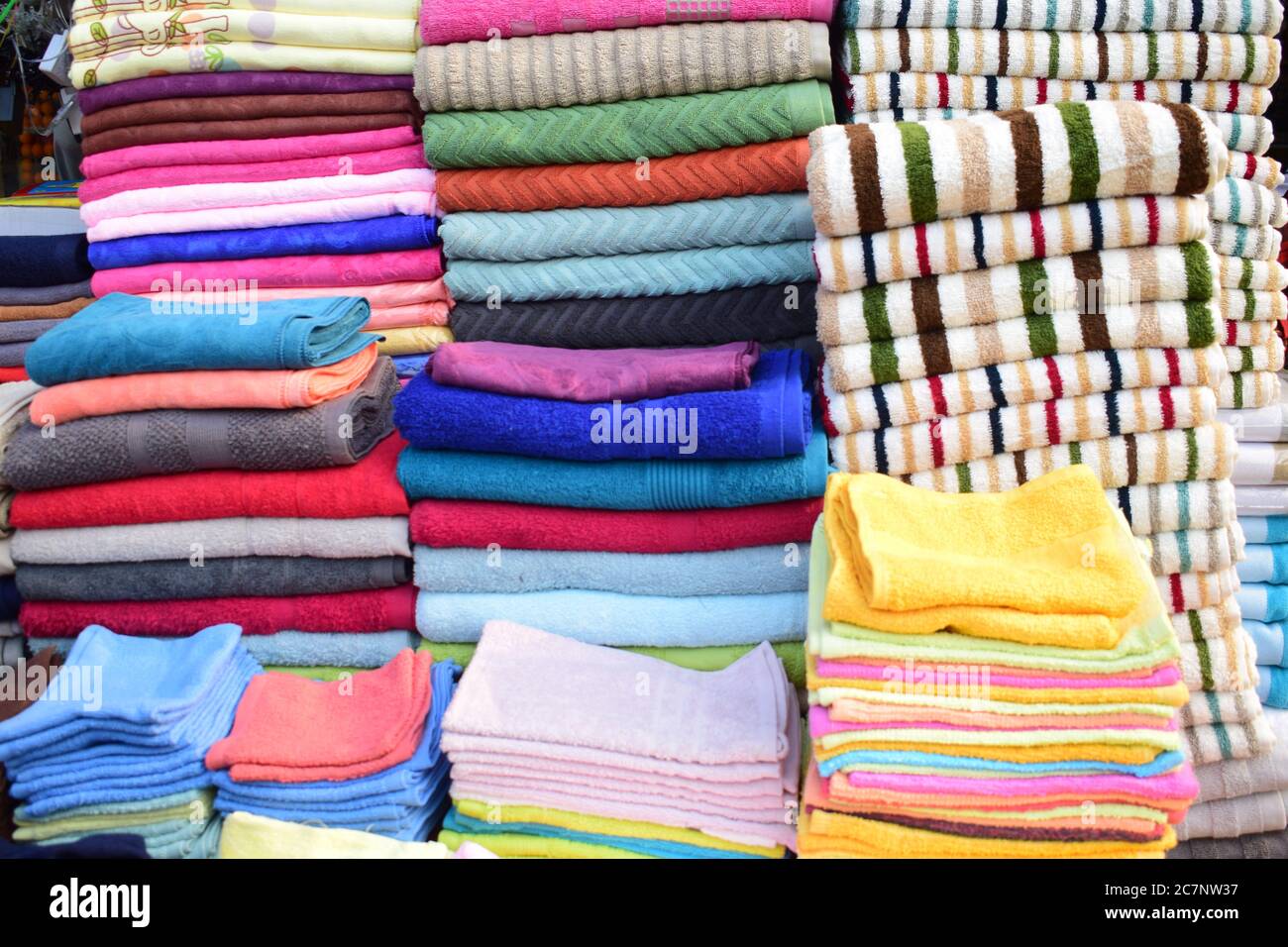 Closeup shot of colorful towels stacked on each other Stock Photo - Alamy