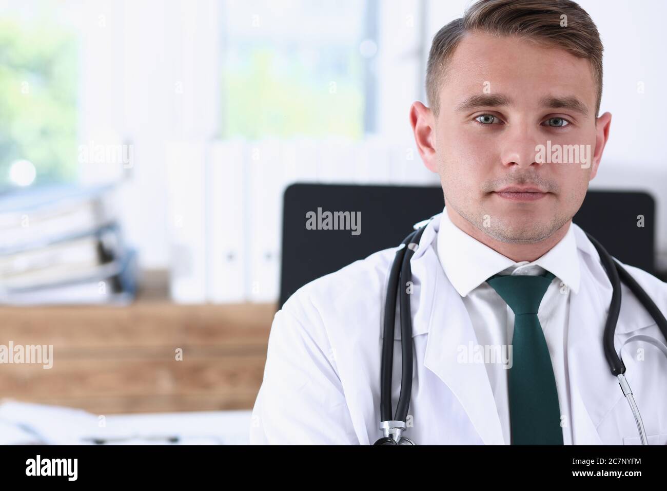 Male medicine doctor hands crossed on his chest Stock Photo - Alamy