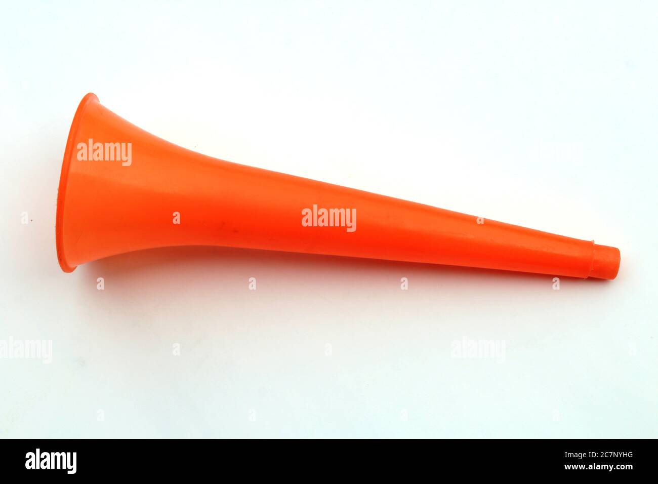 red color plastic horn isolated on white background Stock Photo - Alamy