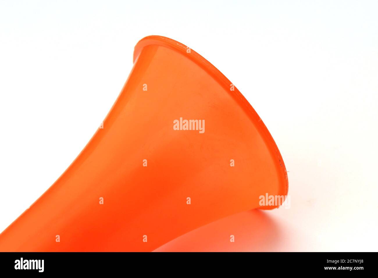 red color plastic horn isolated on white background Stock Photo - Alamy