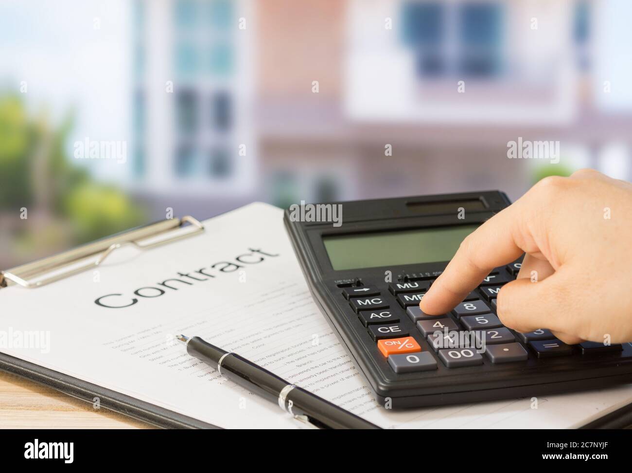 Contractor making calculations estimated construction cost before to ...