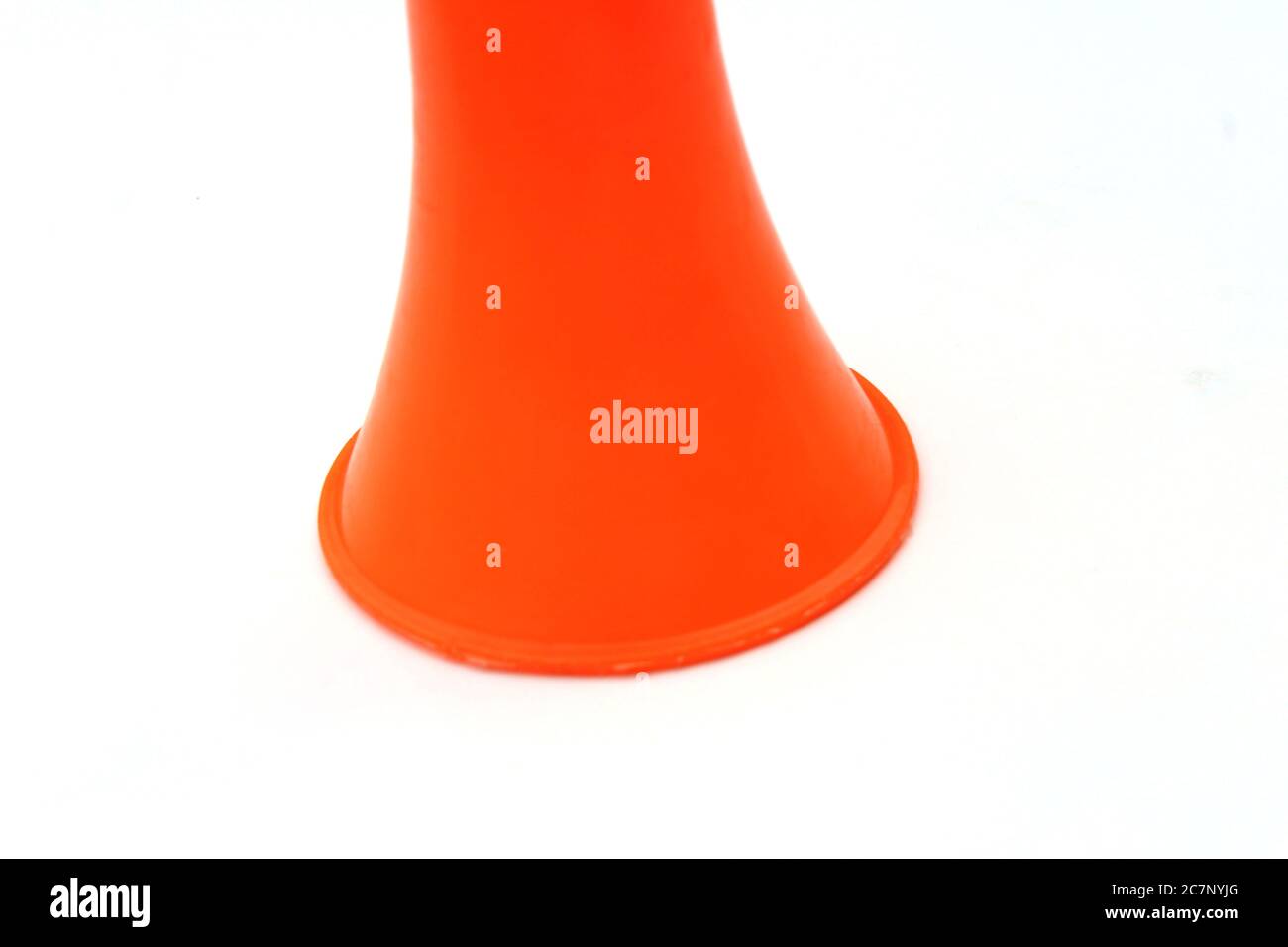 red color plastic horn isolated on white background Stock Photo - Alamy