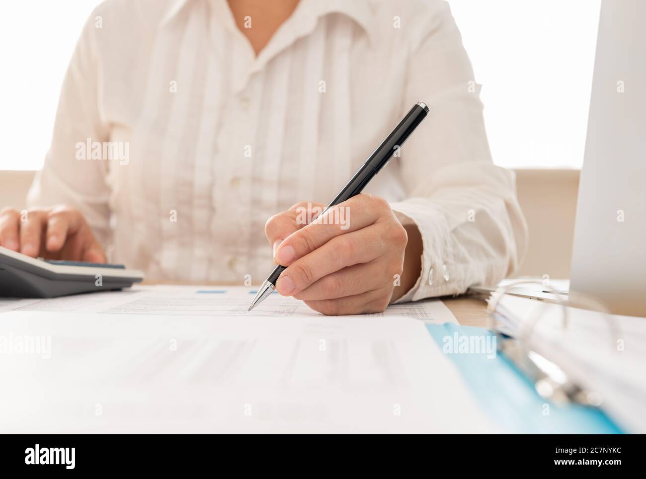 Auditor or internal revenue service staff checking annual financial ...