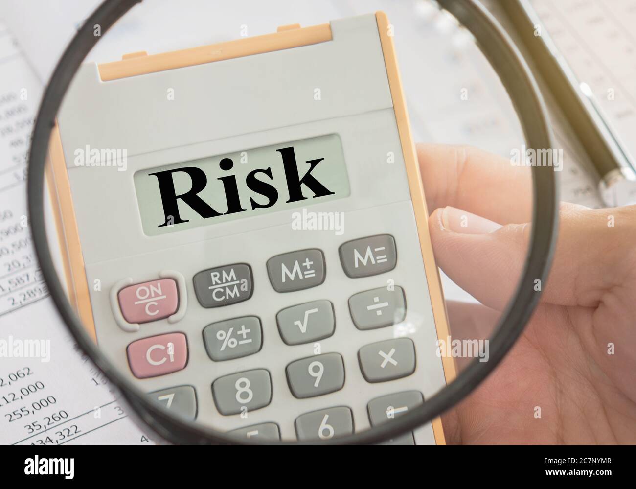 Risk word in calculator and magnifier. concepts of risk management ...