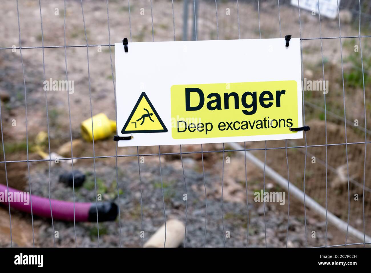 Caution deep excavation yellow warning sign on building site hi-res ...