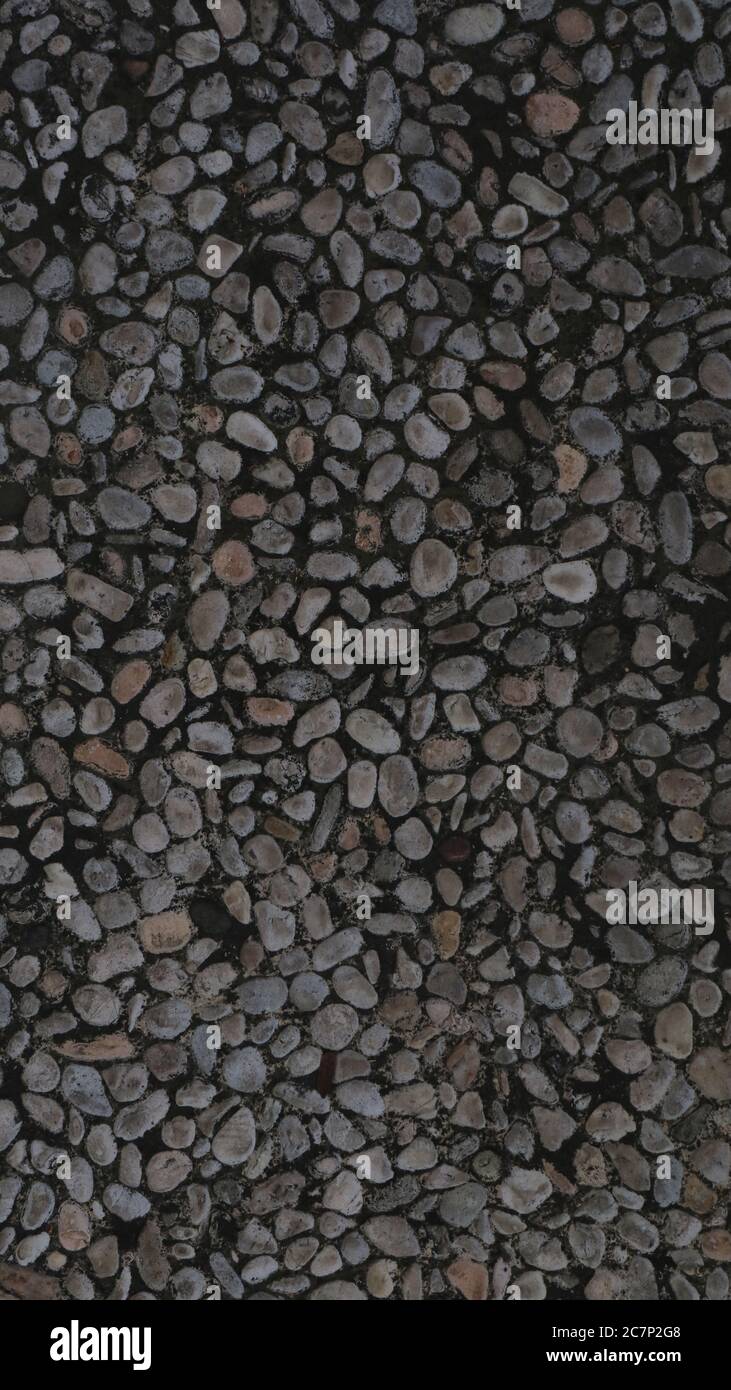 small stone pattern in the ground Stock Photo - Alamy