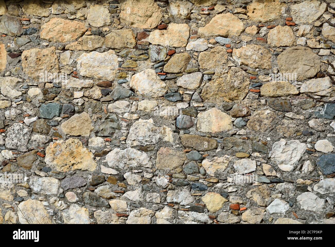 Closeup of an old dirty stone wall under the sunlight at daytime Stock ...