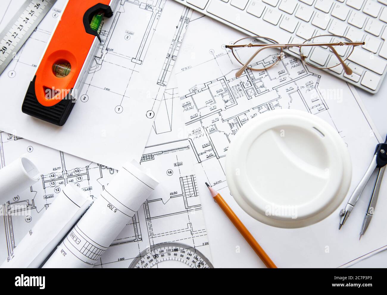 Architect workplace top view. Architectural project, blueprints ...
