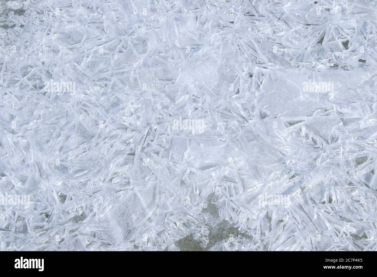Ice texture, background and pattern. Frozen water. Broken ice. White ...