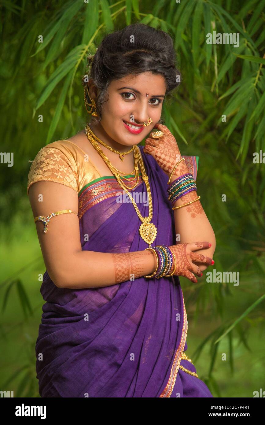 Indian Traditional Beautiful young girl in saree posing outdoors Stock ...