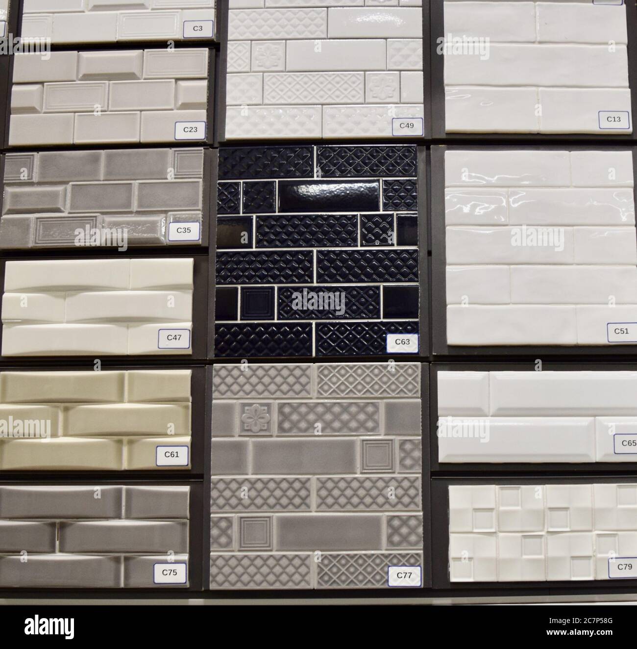 Front view of home tile design samples on display at a store Stock ...