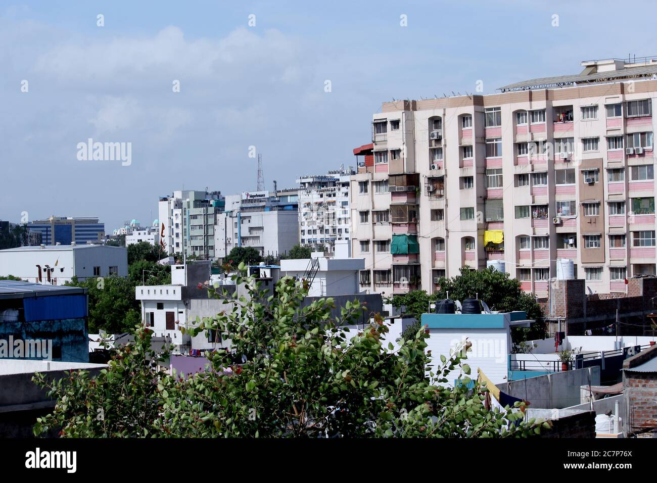 residential buildings and houses in city, Indian street sky background ...