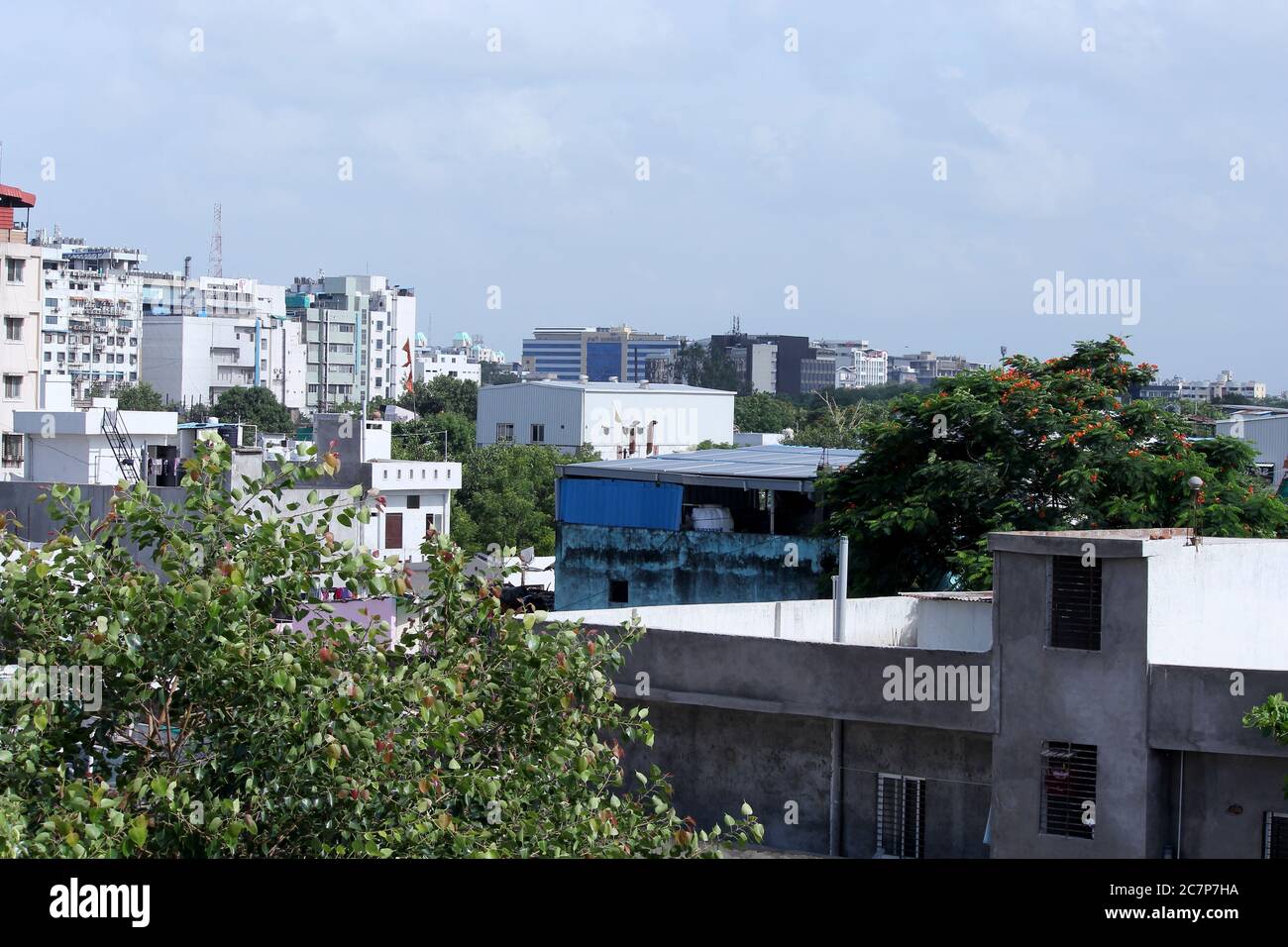 residential buildings and houses in city, Indian street sky background ...