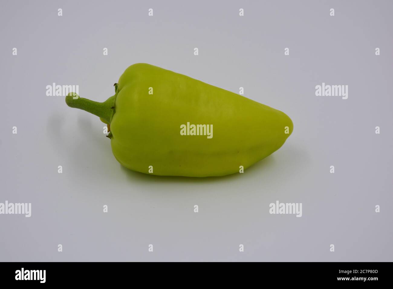 One bell pepper, not hot, sweet crunchy pepper located on a white ...