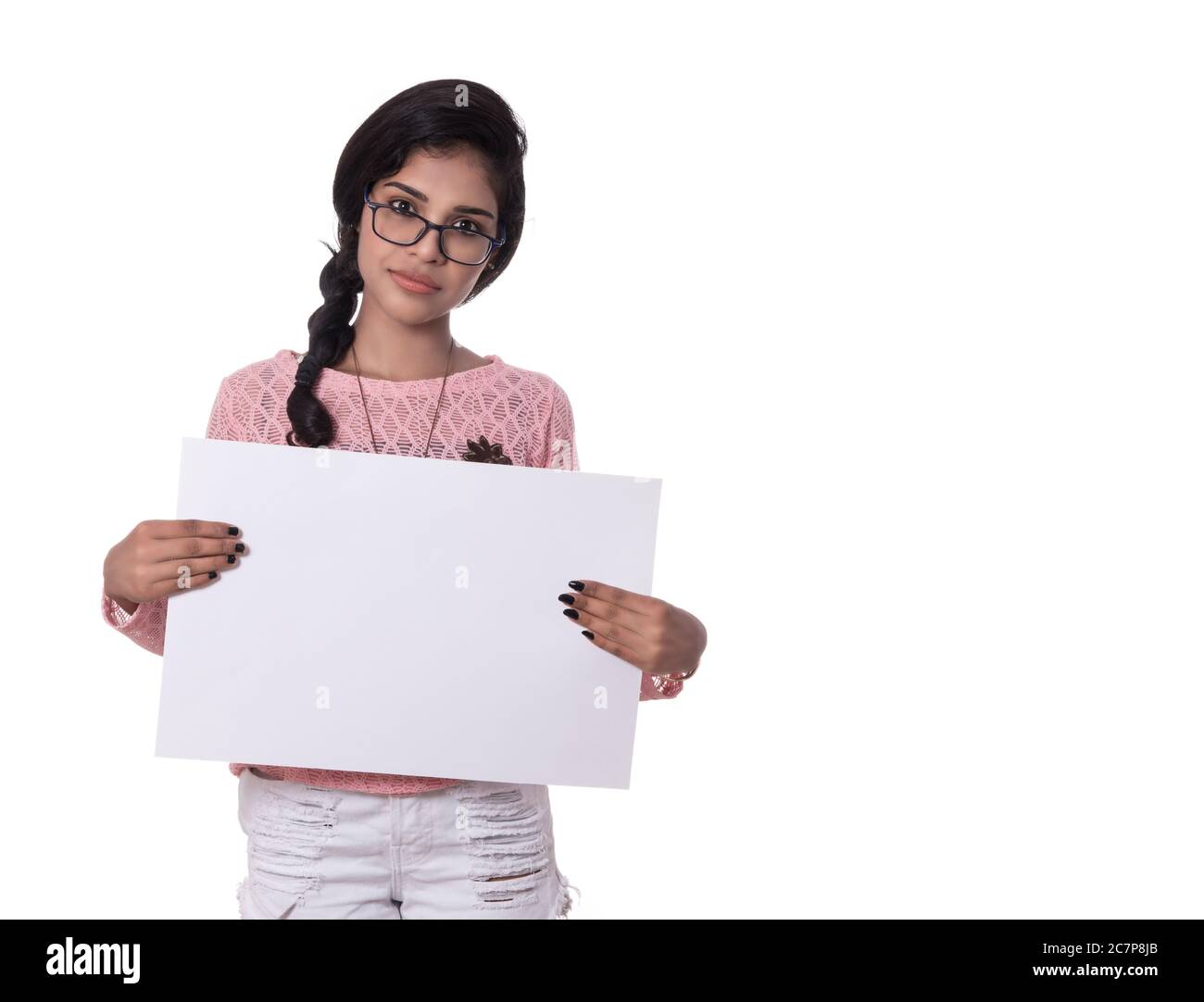 Girl holding white big sign board. Isolated portrait Stock Photo - Alamy