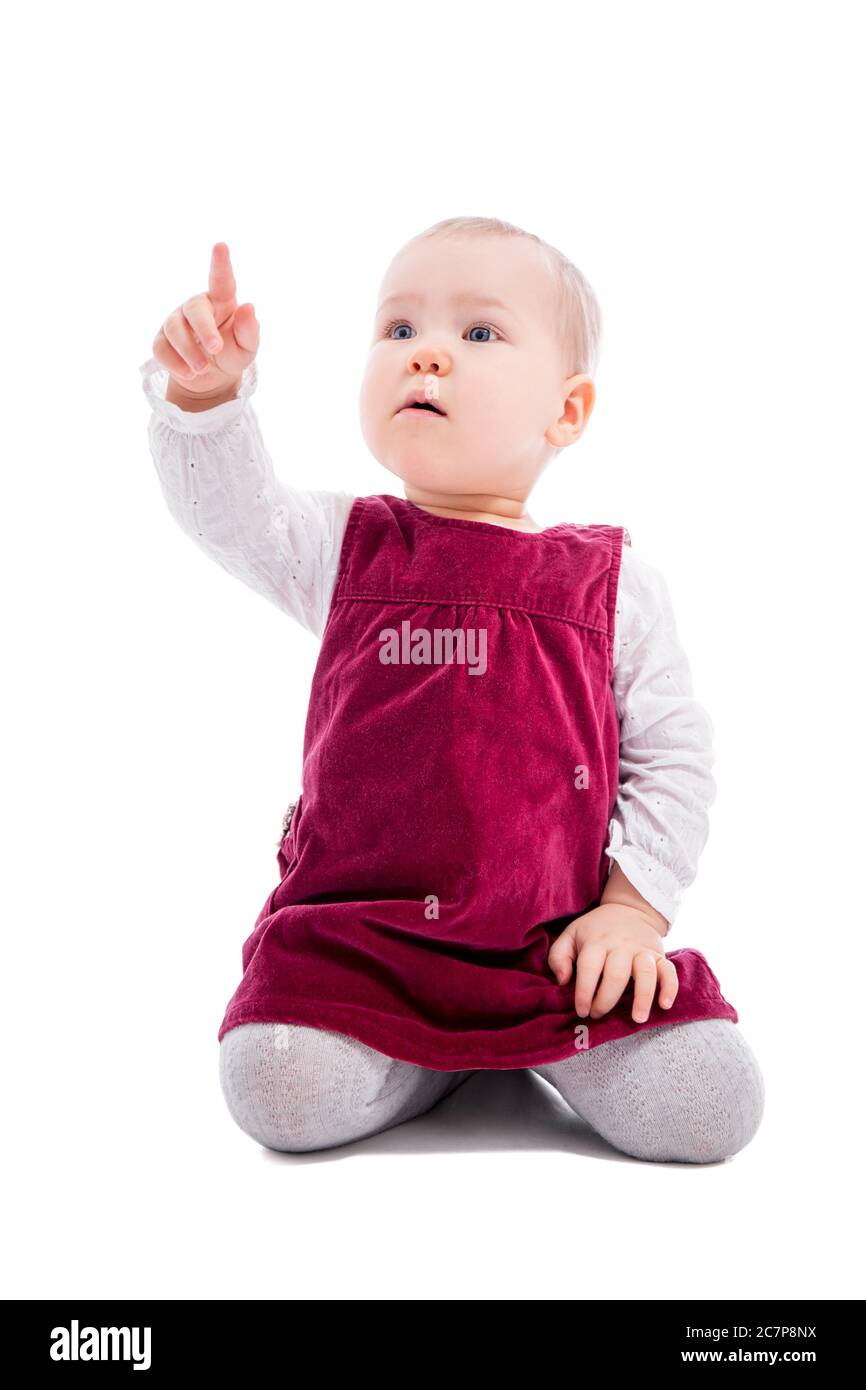 cute baby girl pointing at something isolated on white background Stock ...