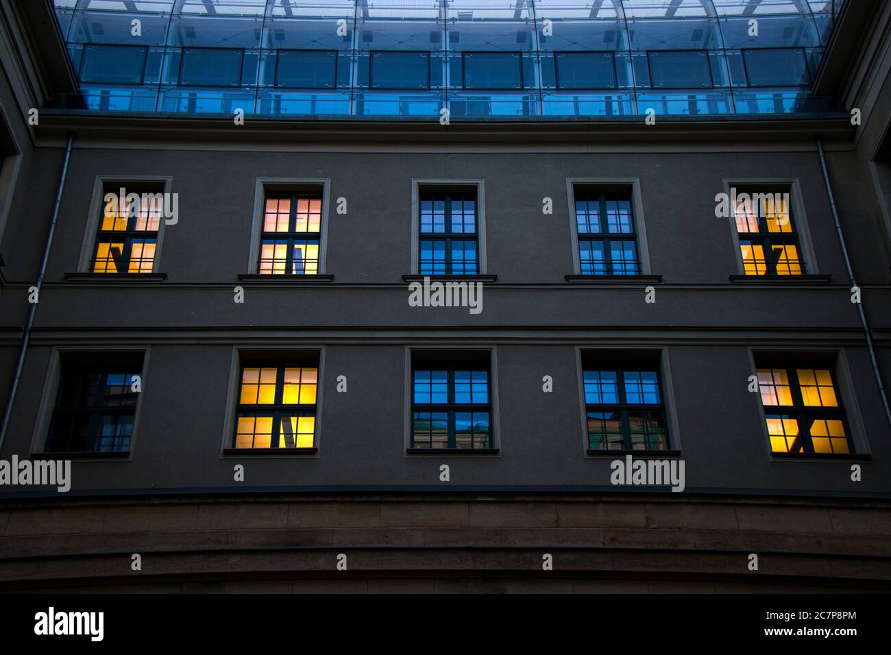 The building in Berlin center, evening time, windows and night lights ...