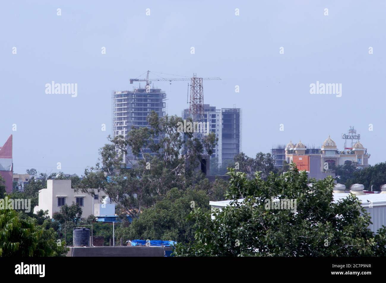 residential buildings and houses in city, Indian street sky background ...