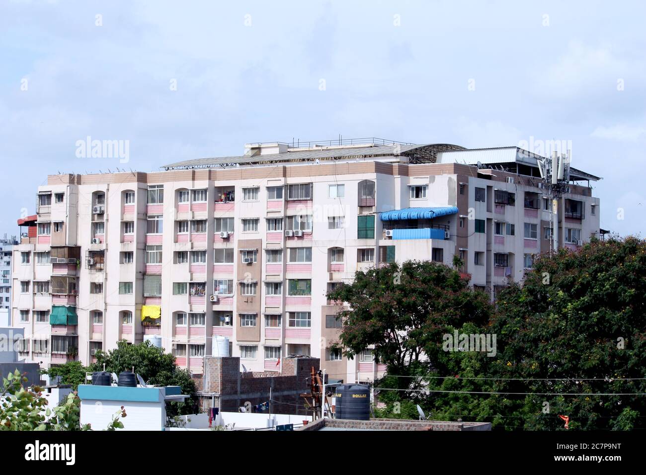 residential buildings and houses in city, Indian street sky background ...