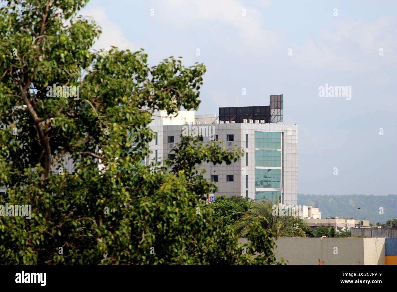 residential buildings and houses in city, Indian street sky background ...
