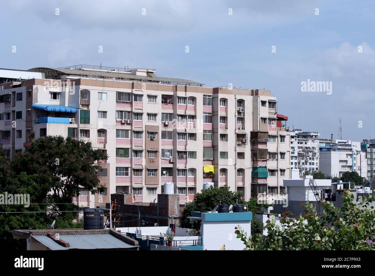 residential buildings and houses in city, Indian street sky background ...