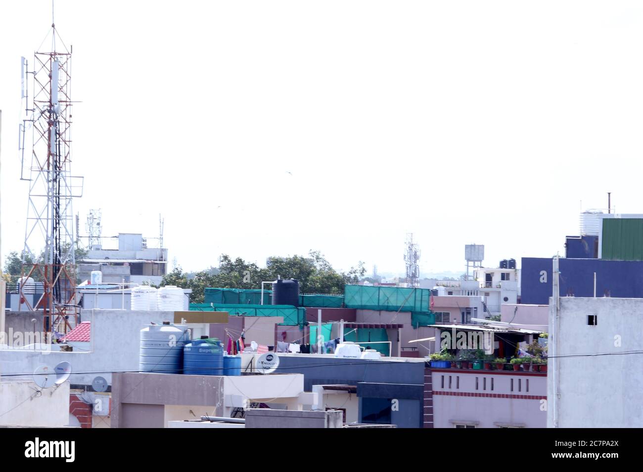 residential buildings and houses in city, Indian street sky background ...