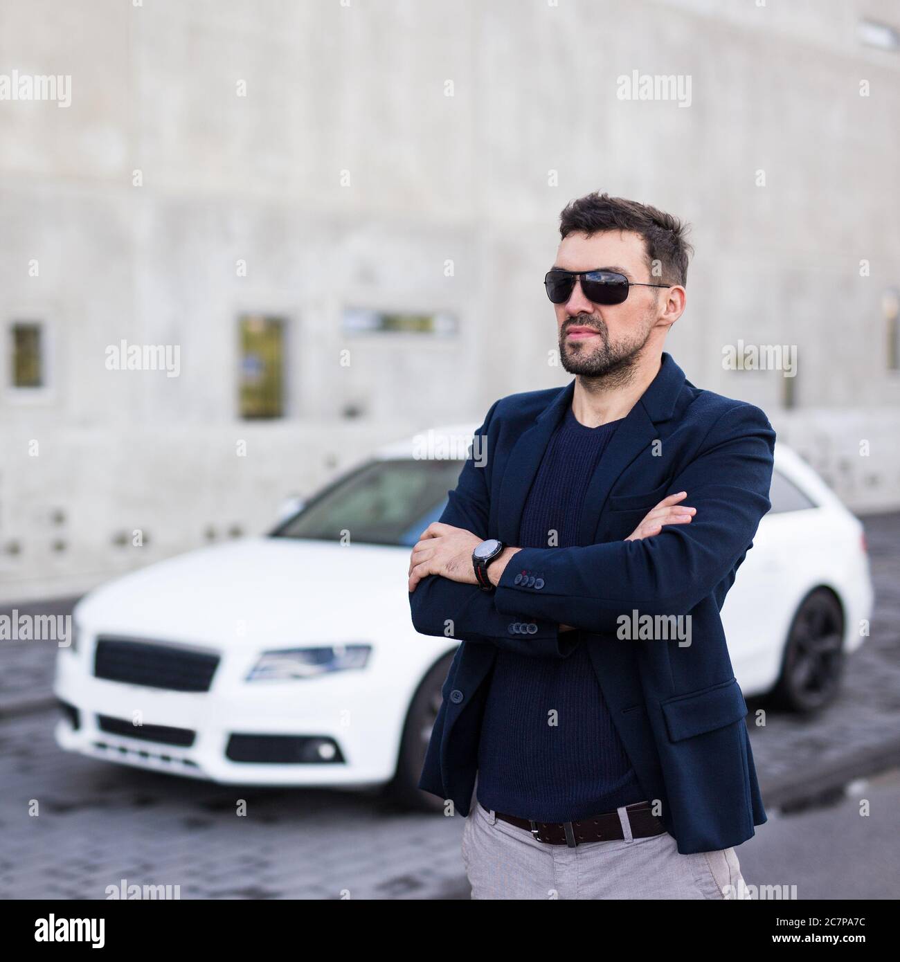 portrait of driver posing with his modern car Stock Photo - Alamy