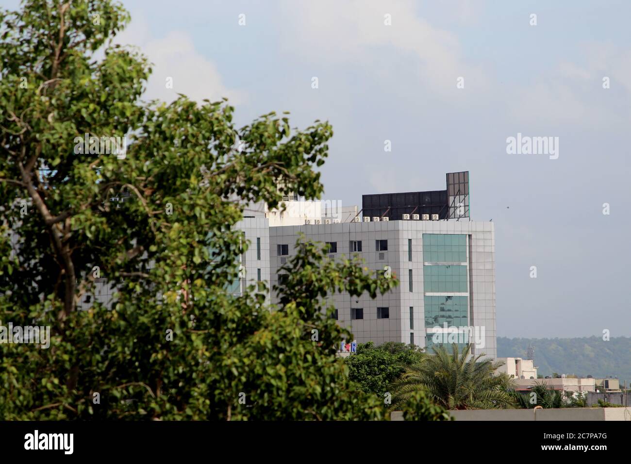 residential buildings and houses in city, Indian street sky background ...