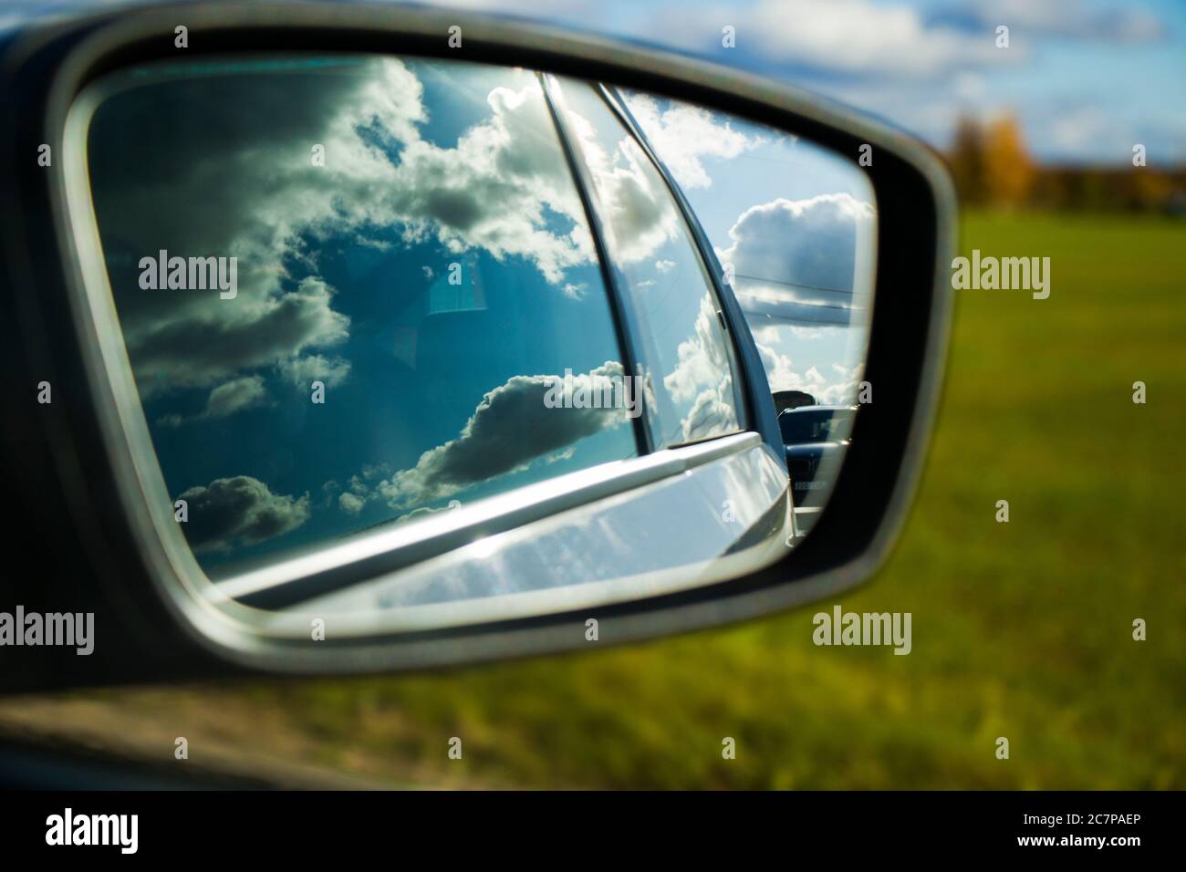 View in the car mirror.Highway, autobahn and road landscape. Automobile ...